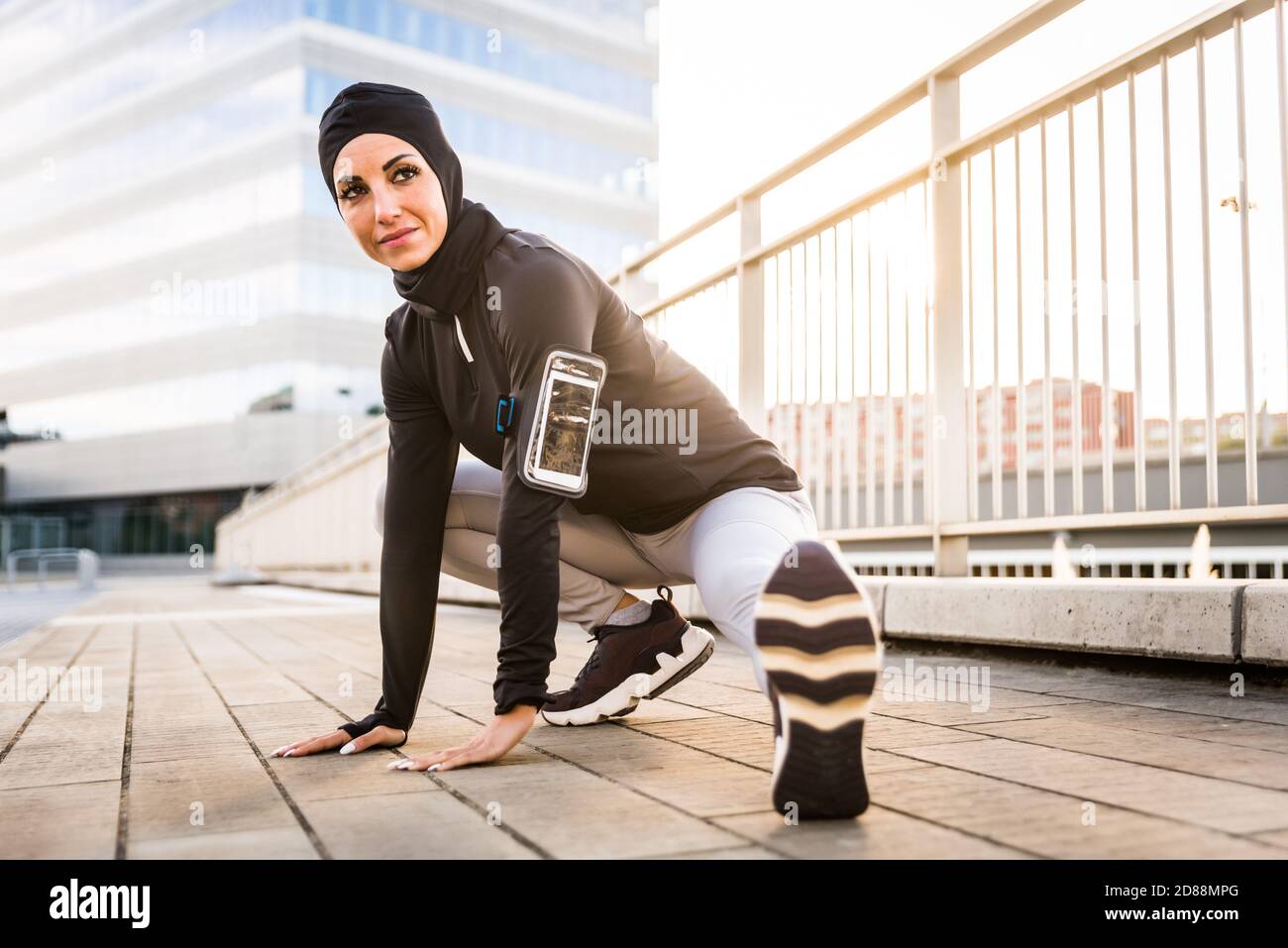 Muslim sportive girl with fit body training outside - Beautiful woman ...