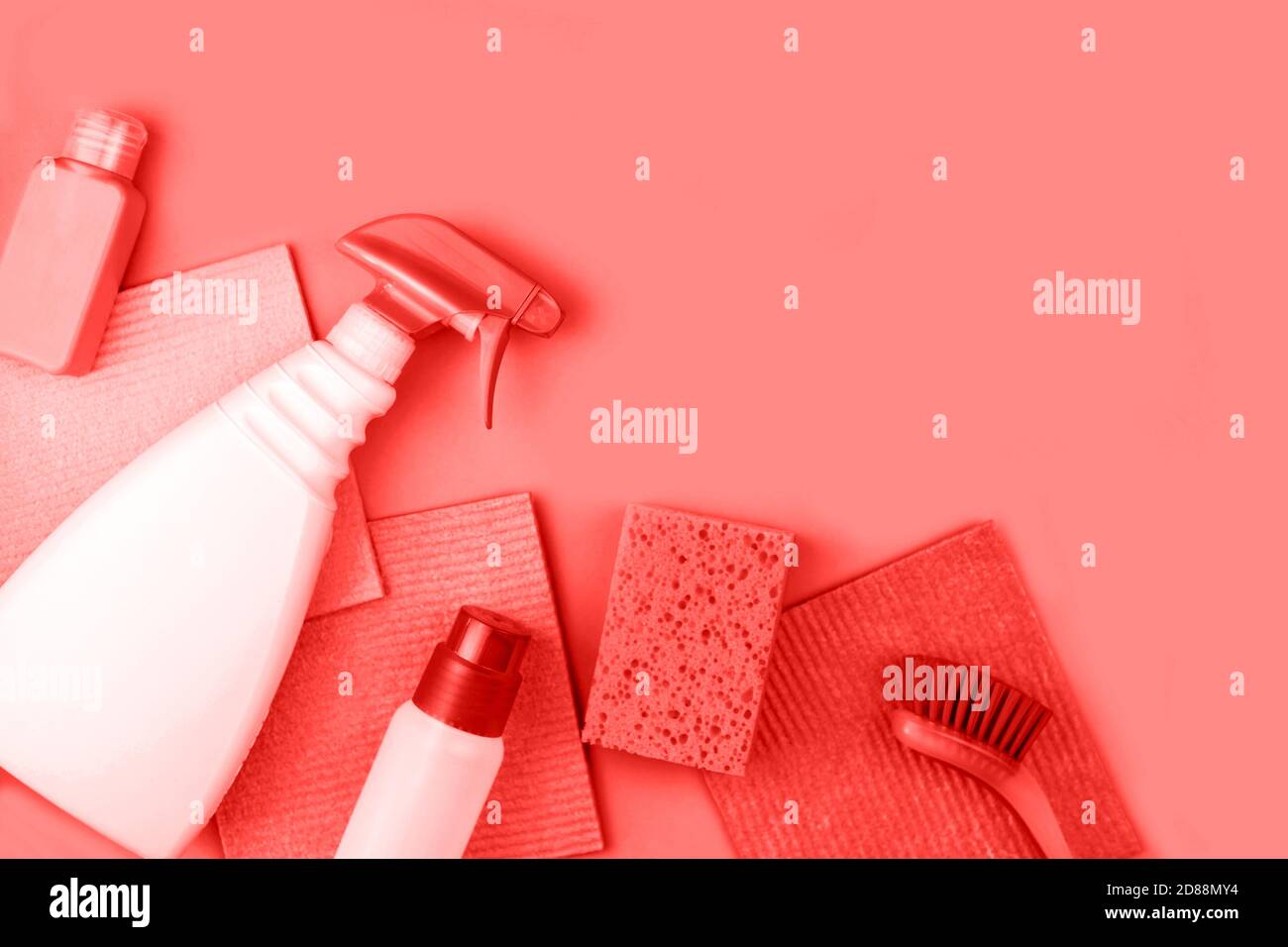 House cleaning products are on red background Stock Photo - Alamy