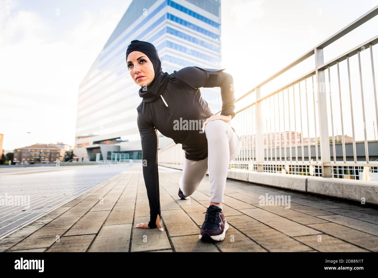 Muslim sportive girl with fit body training outside - Beautiful woman ...
