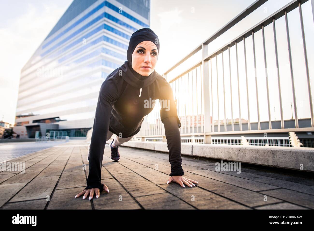 Muslim sportive girl with fit body training outside - Beautiful woman ...