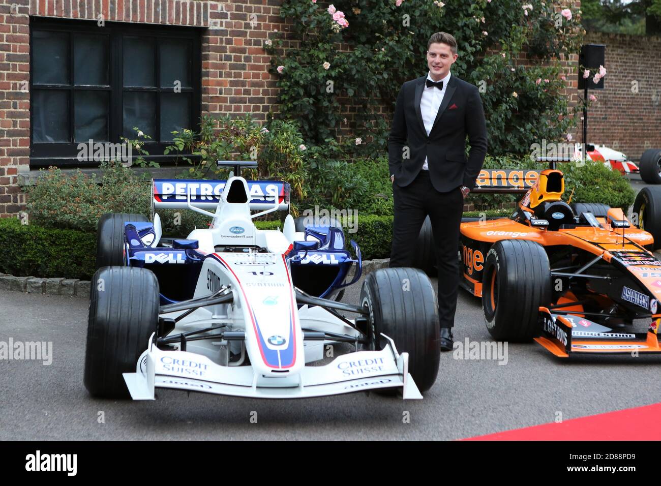 Love island actor Dr Alex George attends the 2019 Grand Prix Ball at ...