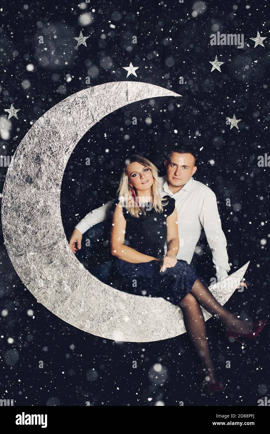 Picture of a young girl posing in the scenery of a big moon with her ...