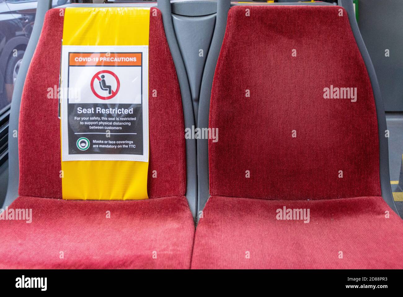 Social distancing signs on a TTC bus during the Coronavirus pandemic ...