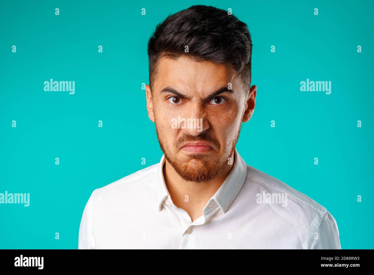 Angry furious hispanic man in rage portrait Stock Photo - Alamy