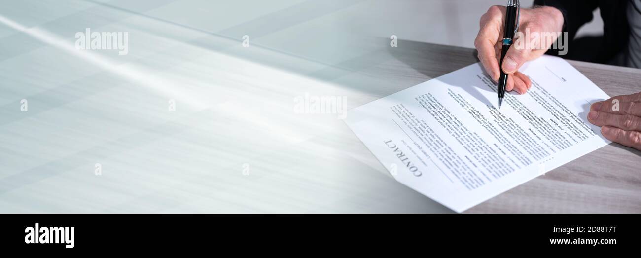 Male hands checking content of a contract; panoramic banner Stock Photo ...