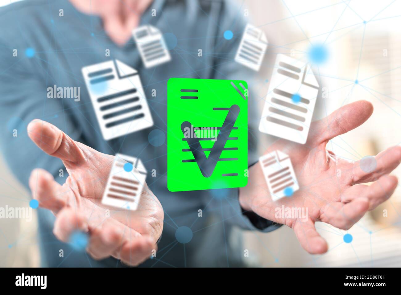 Document validation concept above the hands of a man in background ...