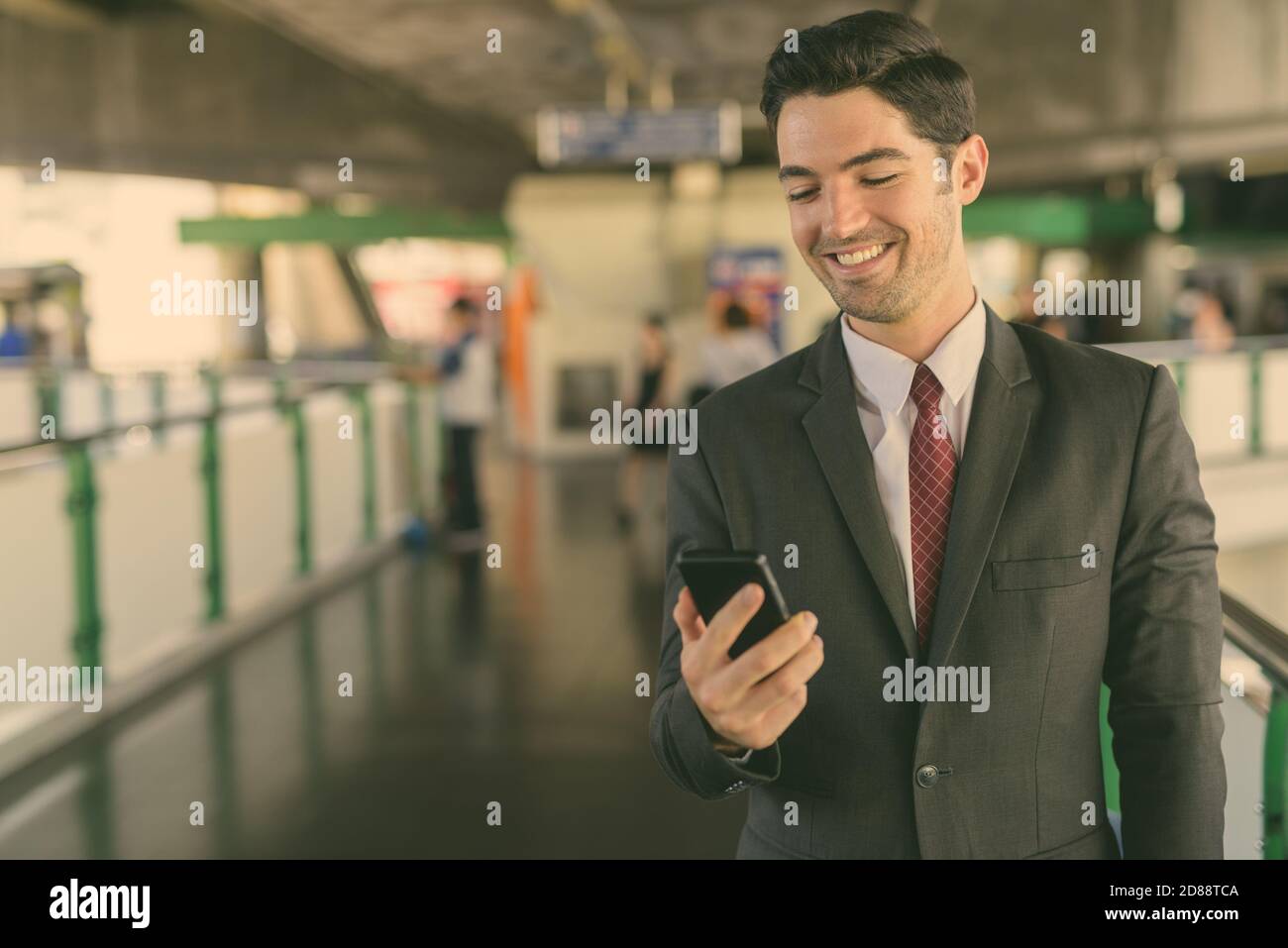 Young handsome businessman exploring the city of Bangkok, Thailand ...
