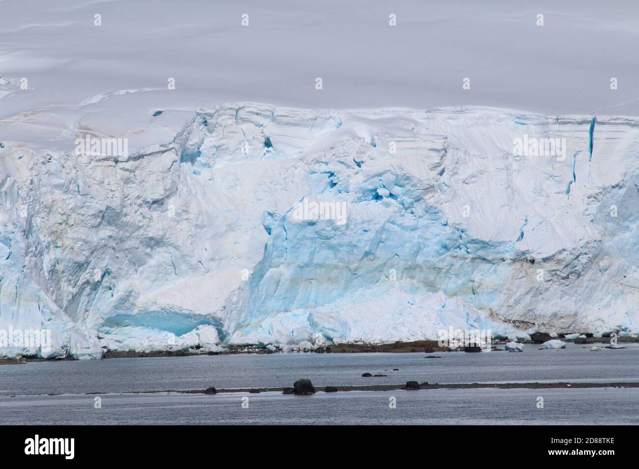 Iced coasts of the Antarctic Peninsula. The mountains in the Gerlache ...