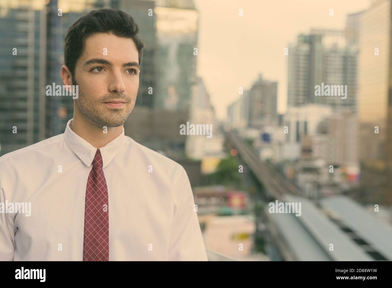 Young handsome businessman exploring the city of Bangkok, Thailand ...