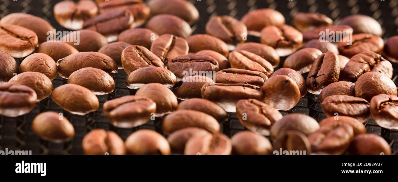 Broken coffee beans, background of roasting coffee beans Stock Photo ...