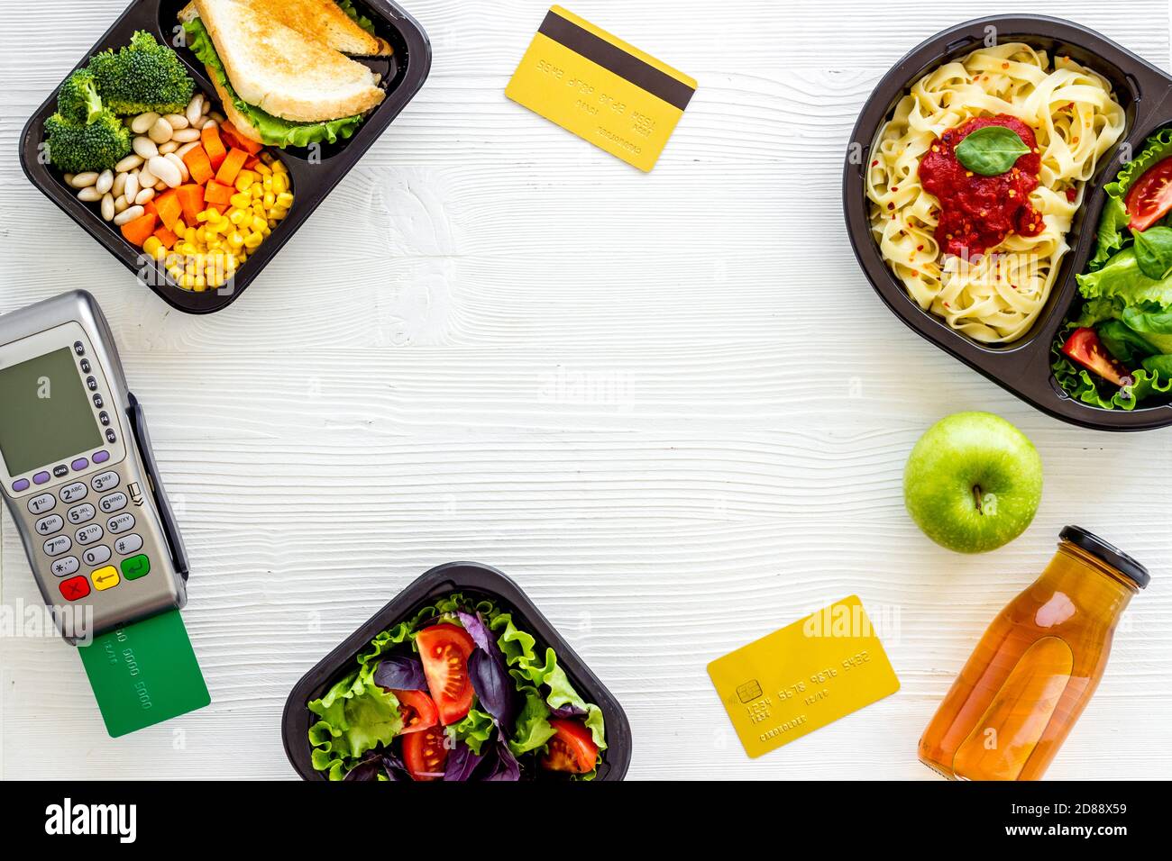 Food delivery payment with terminal and lunch boxes with meal Stock ...