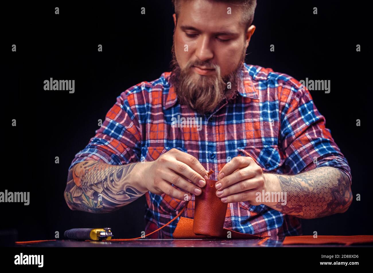 Leather Currier making quality products in his work area Stock Photo ...
