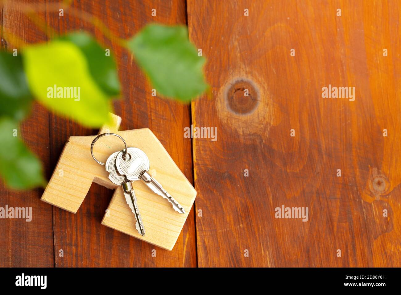 Wooden house model miniature and house keys Stock Photo - Alamy