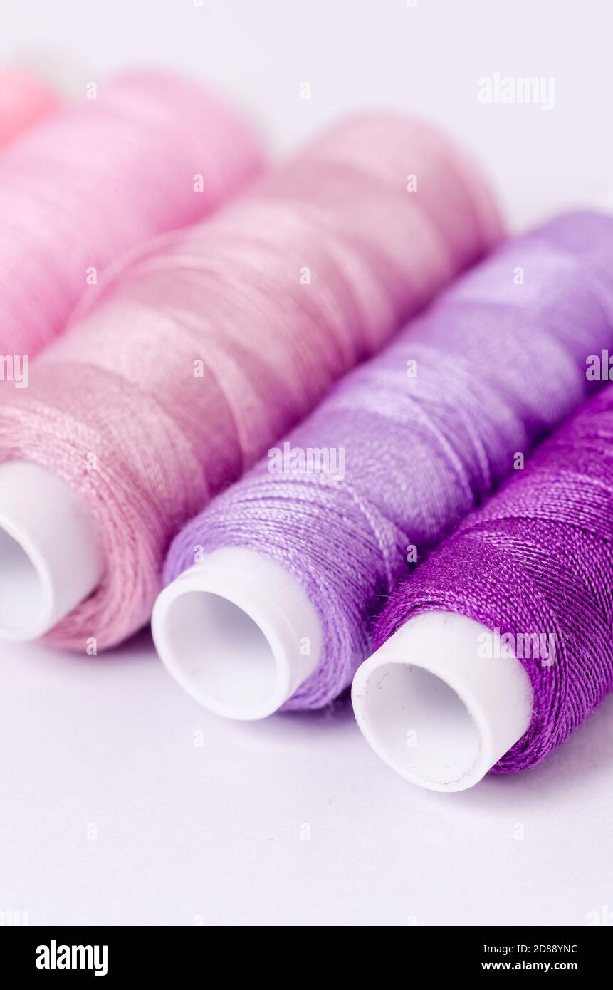 Pink spools threads in workshop hi-res stock photography and images - Alamy