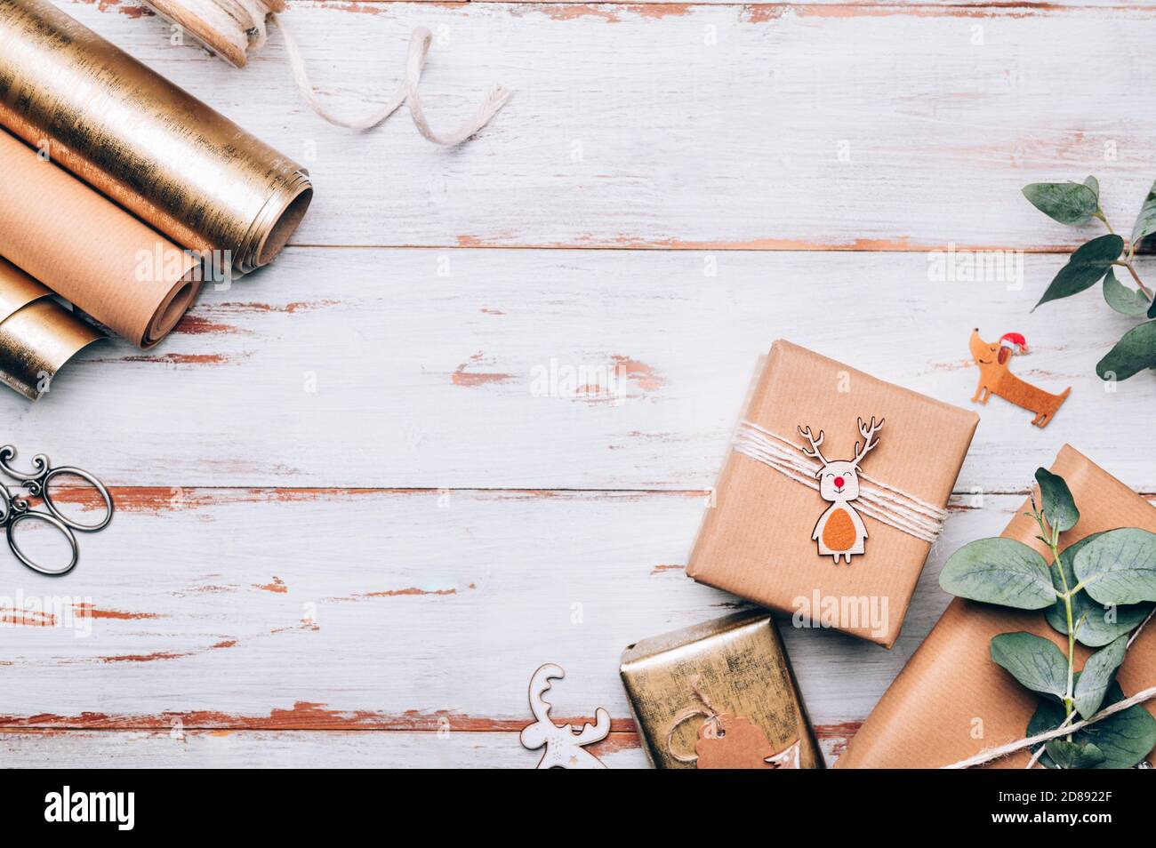 Gift wrapping process, preparation for Xmas Stock Photo - Alamy