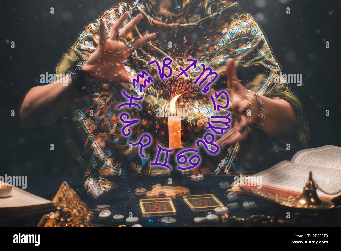 Astrology and divination. Fortune tellers tell fortunes by candle. In ...