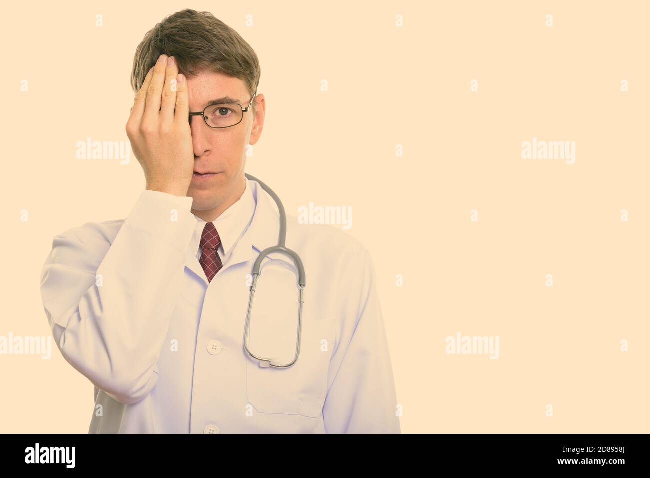 Exhausted stressed doctor hi-res stock photography and images - Alamy