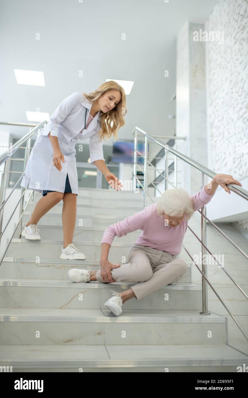 Stairs senior help down hi-res stock photography and images - Alamy
