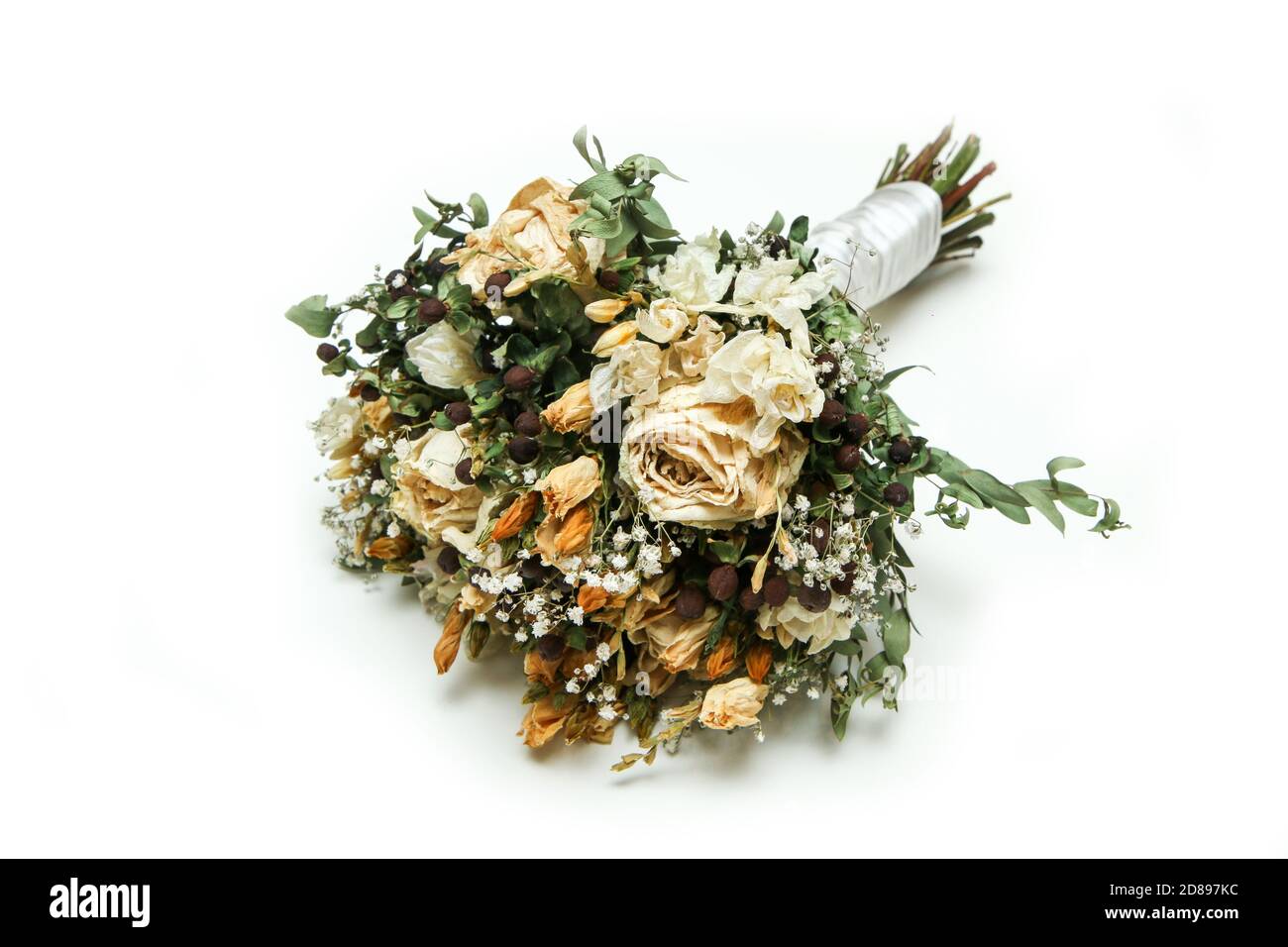 The dried wedding bouquet of roses and other flowers. A saved memory ... The dried wedding bouquet of roses and other flowers. A saved memory ...