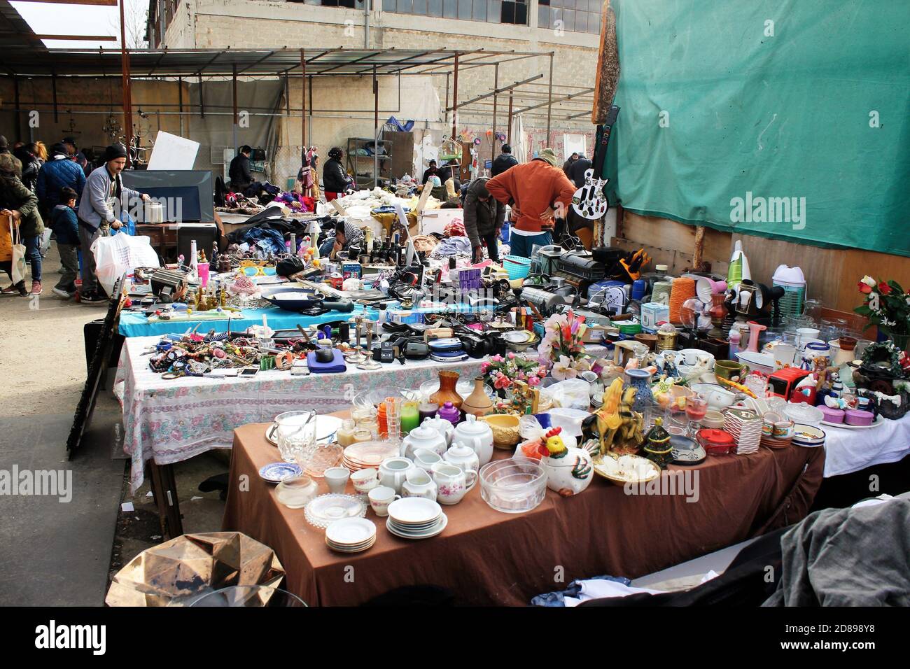 Second hand items for sale at street market in Athens, Greece, January ...