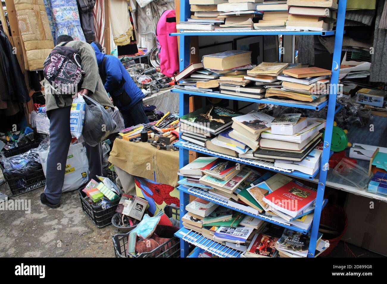 Second hand items for sale at street market in Athens, Greece, January ...