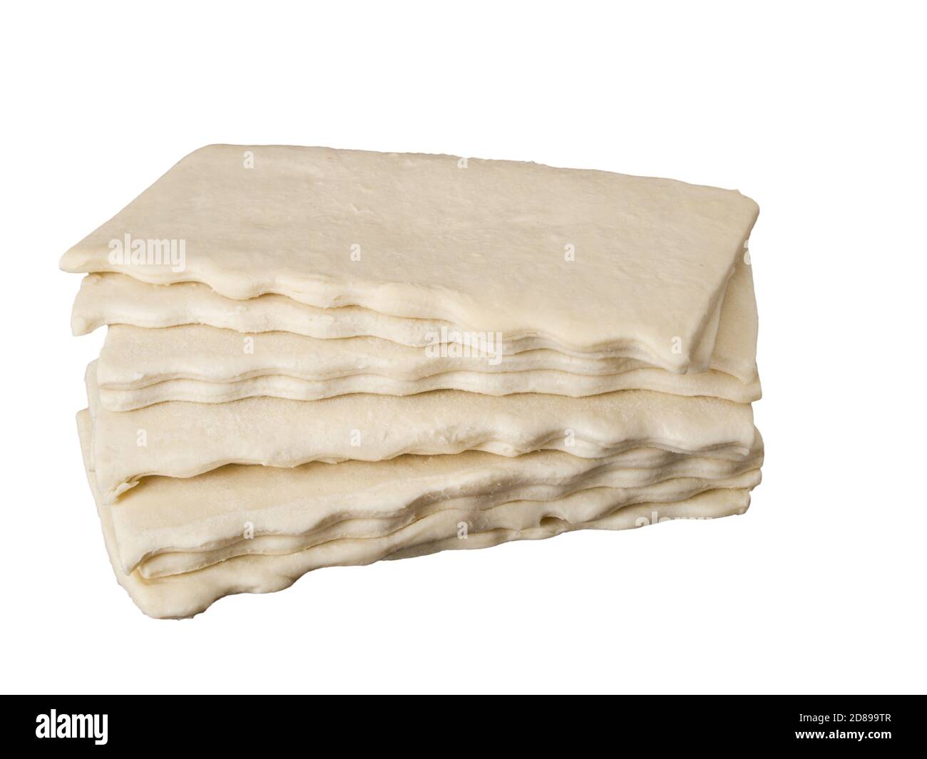 Uncooked flaky pastry slices isolated on white background Stock Photo ...