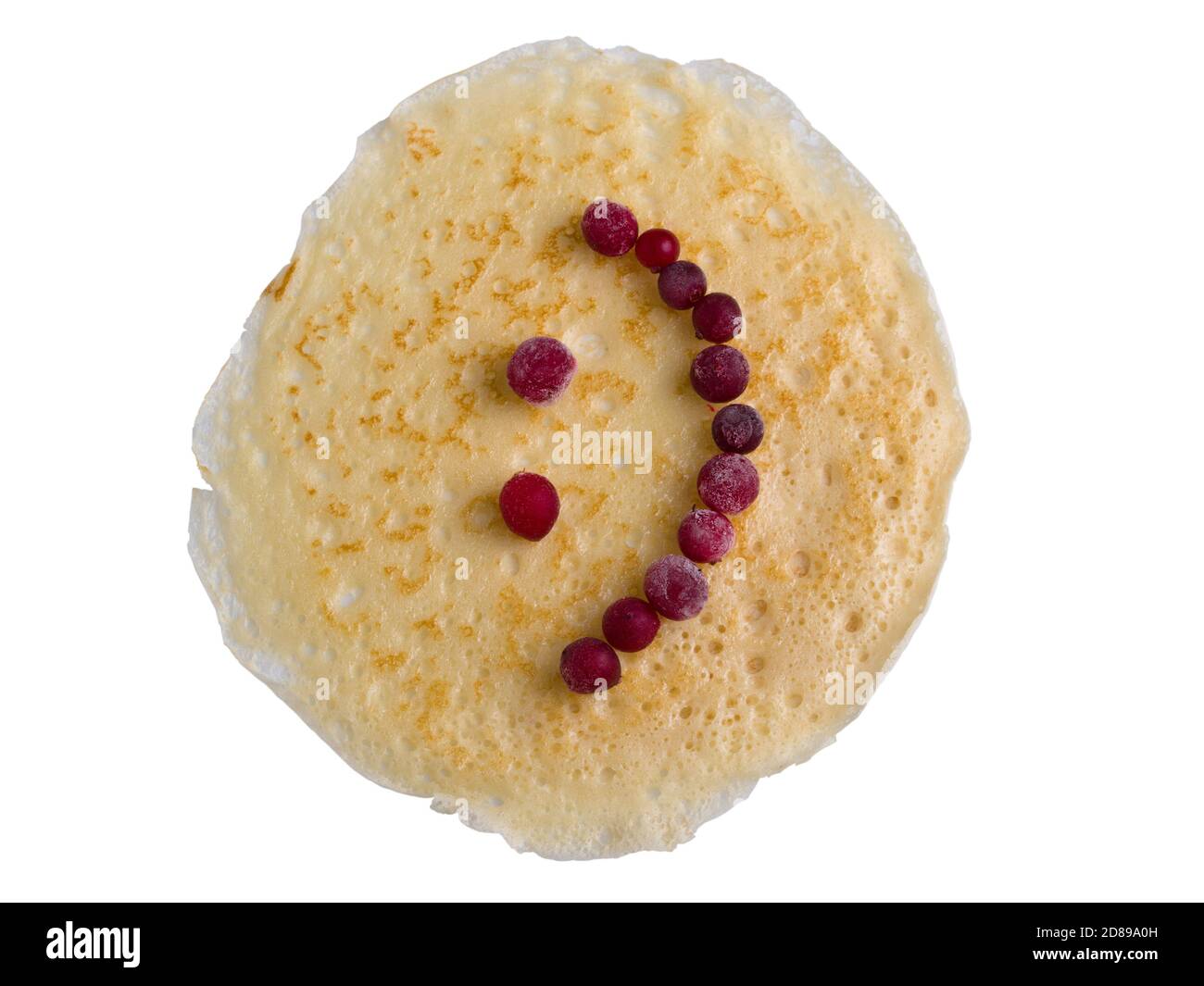 Pancake with smiley emotion sign from cranberries isolated on white ...