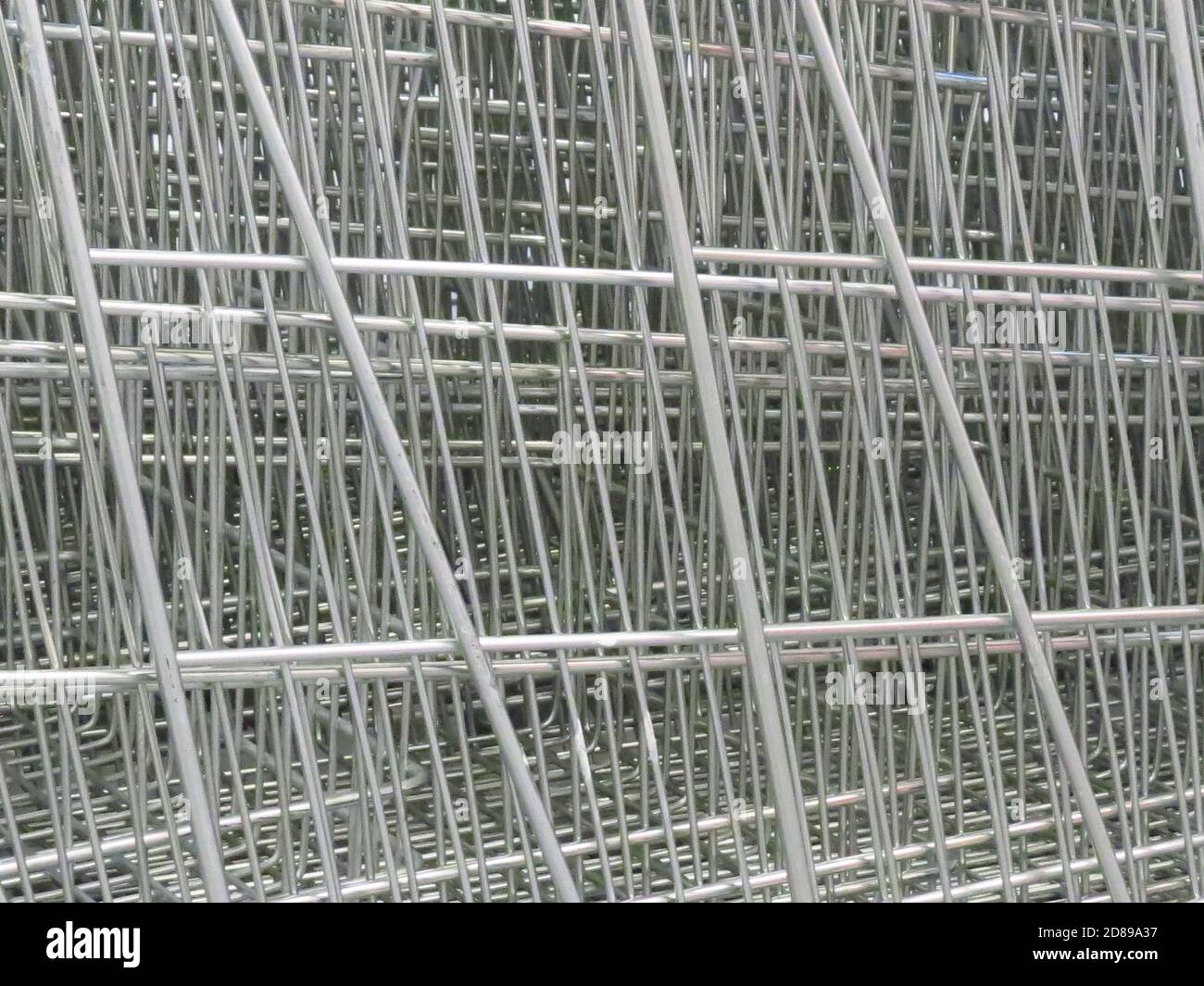 Closeup of welded steel wire mesh Stock Photo - Alamy
