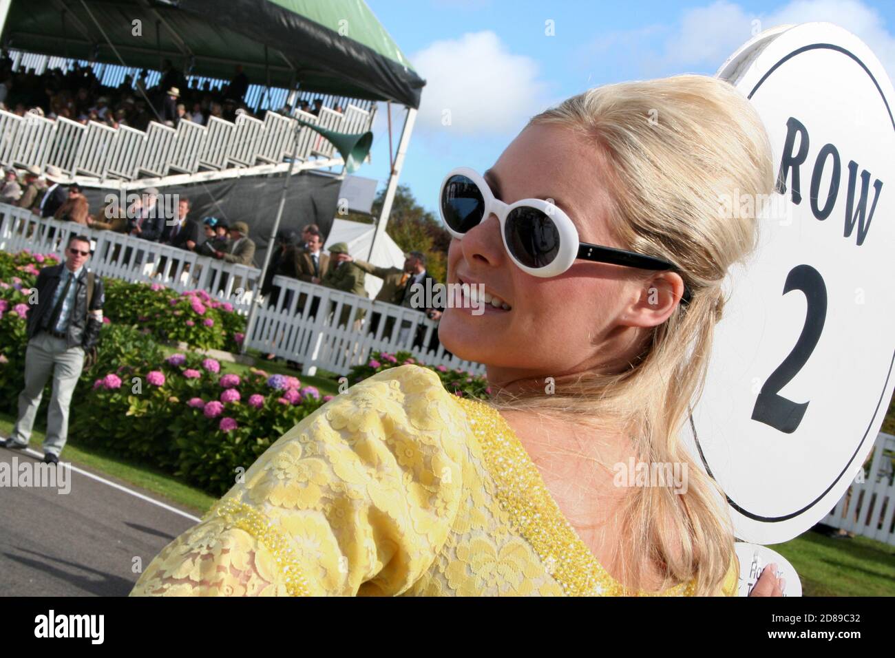 Beautiful Grid Girls at 2011 Goodwood Revival Stock Photo - Alamy