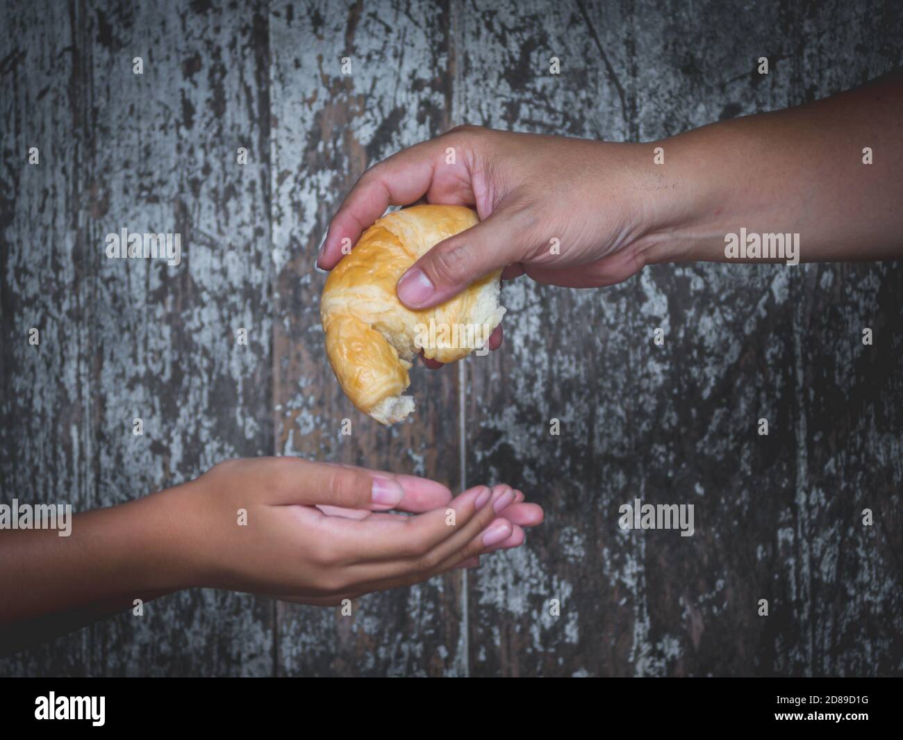 Hands Giving Food
