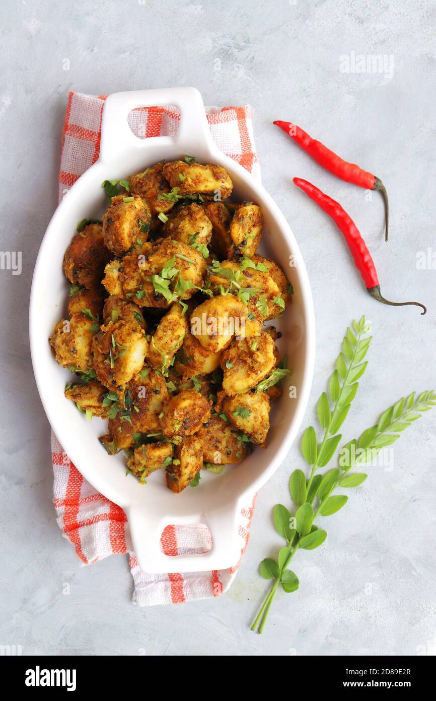 Stir fried taro roots. Arbi ki sabji, Taro roots masala curry. Arbi ...