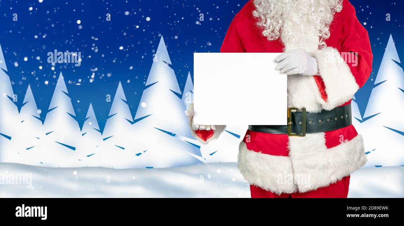 santa holds an empty white sign for advertising in the camera wintery ...