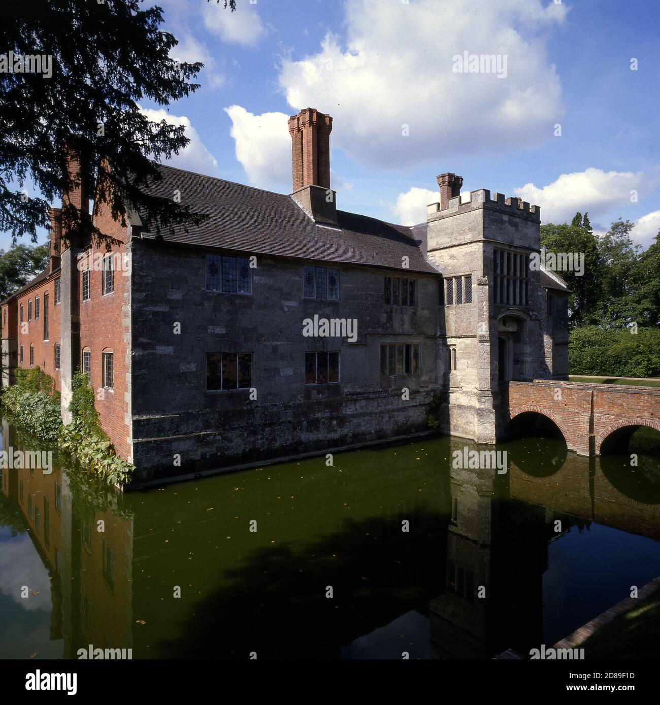 Timber framed manor house with a moat and walled gardens hi-res stock ...