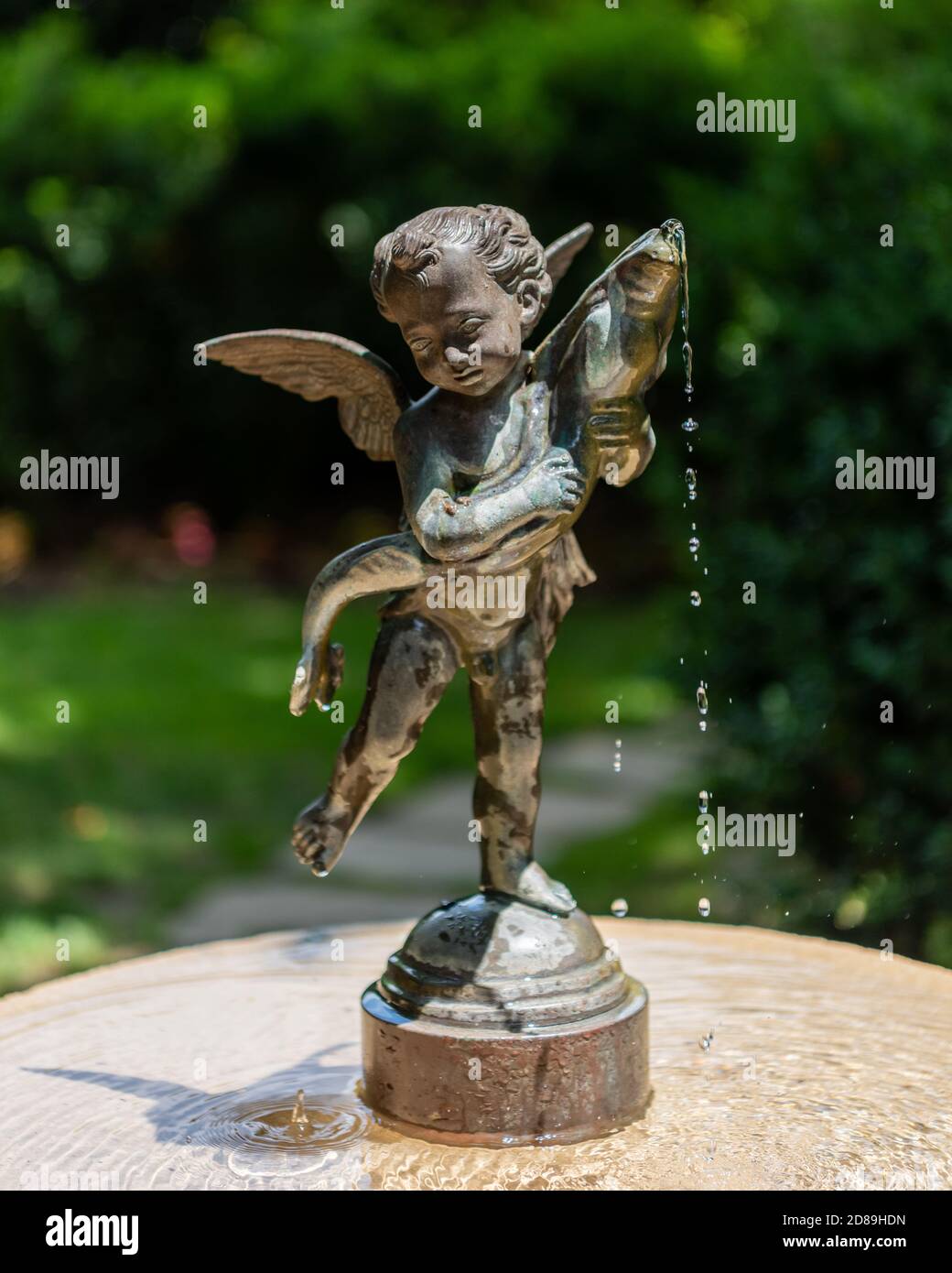Bronze cherub water feature hi-res stock photography and images - Alamy