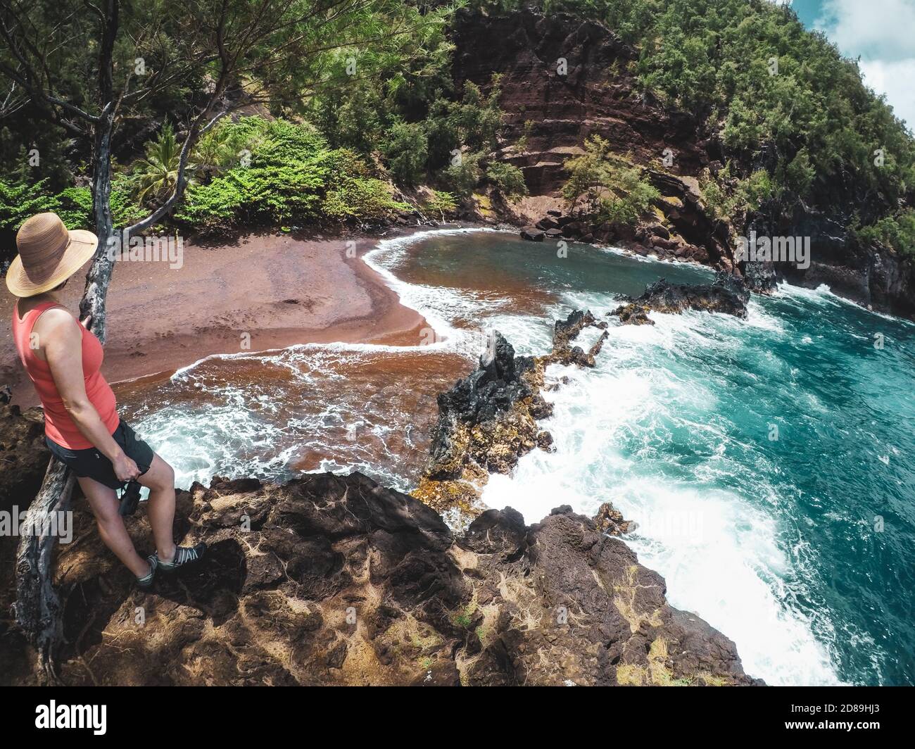 Female Hiker Looking at the Red Sand Beach, Maui, Hawaii, USA Stock ...