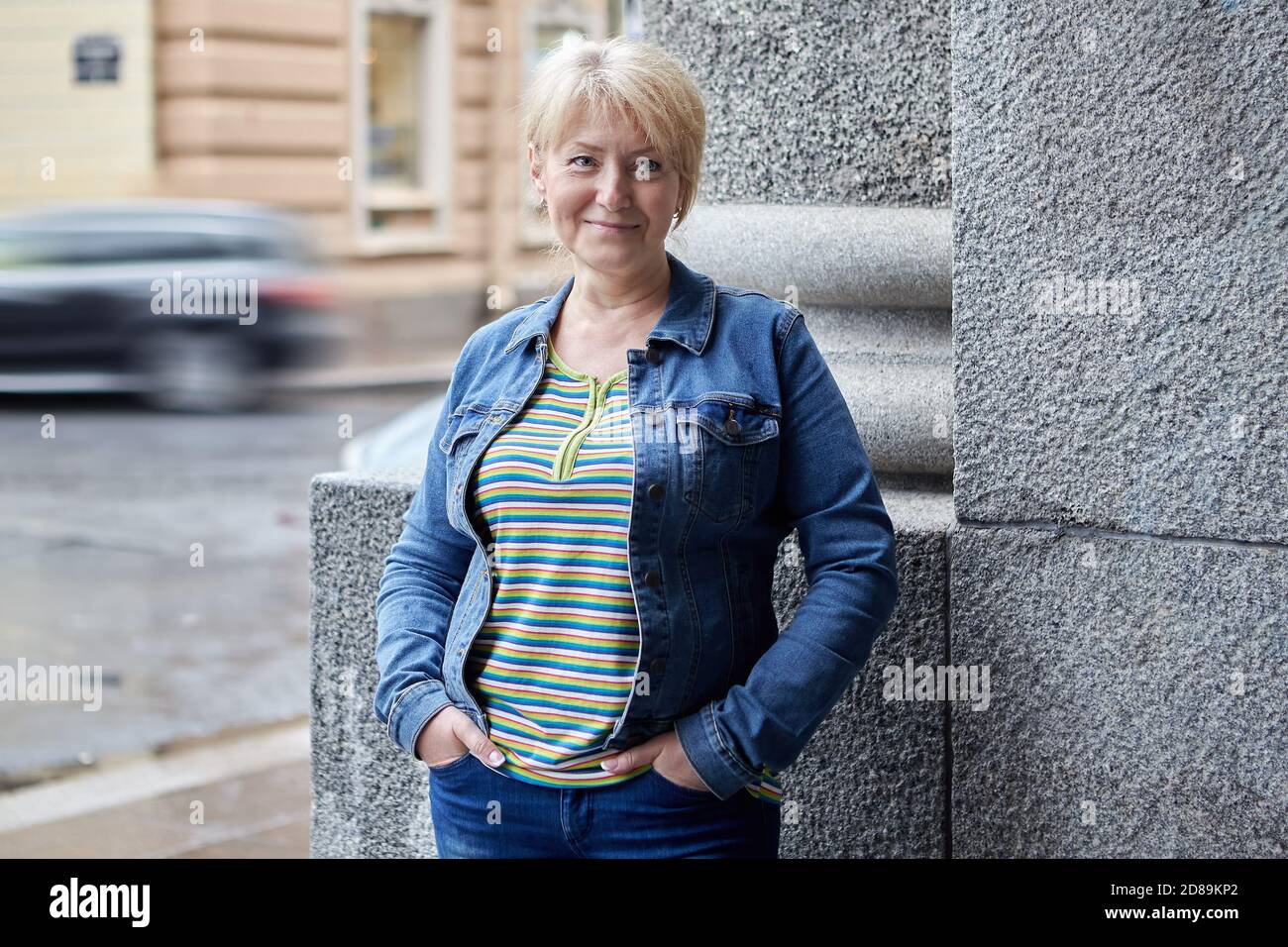 White smiling lady on city street in St. Petersburg, Russia Stock Photo ...