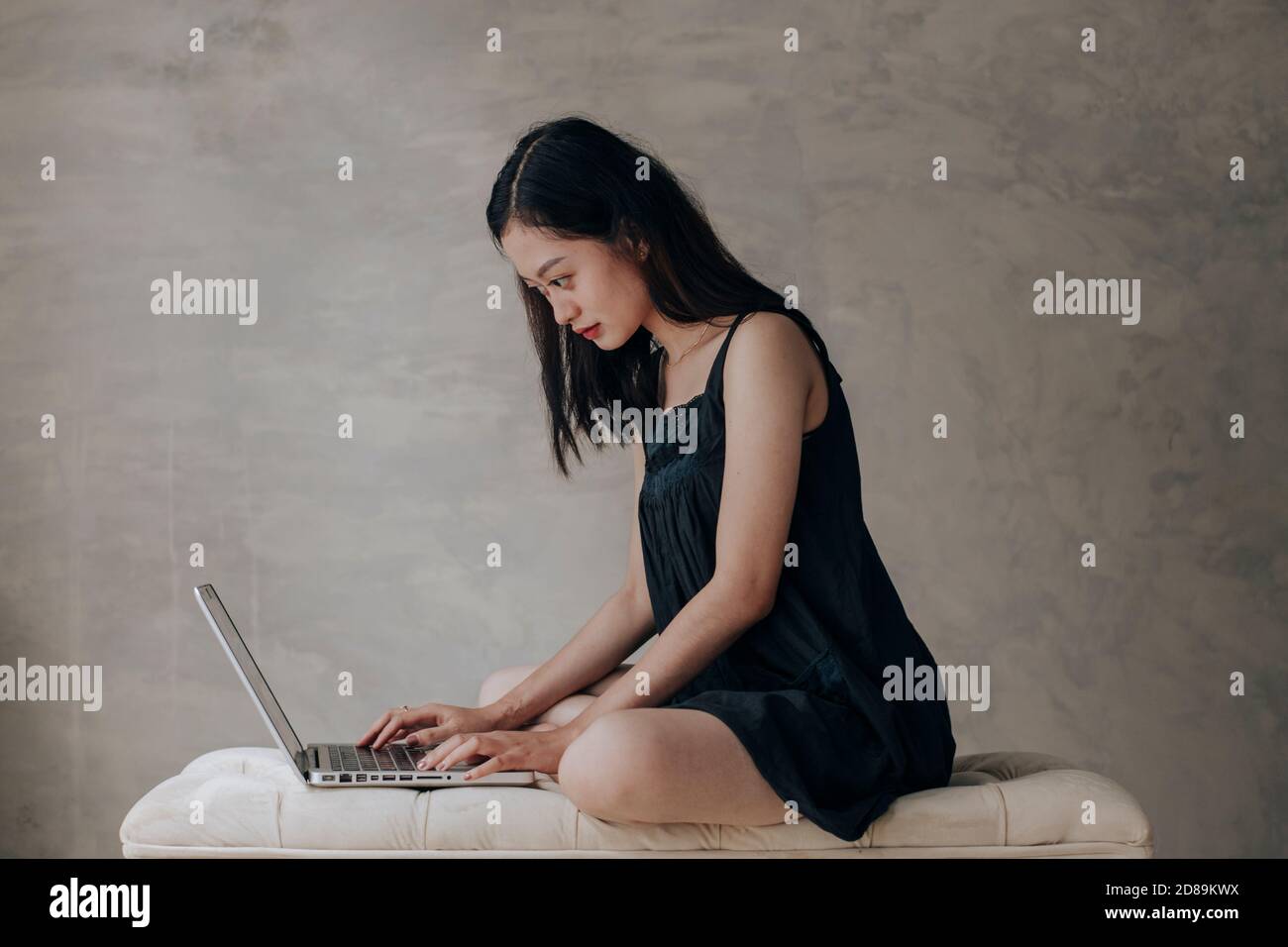 Asian beautiful woman thinking idea with laptop computer Stock Photo ...