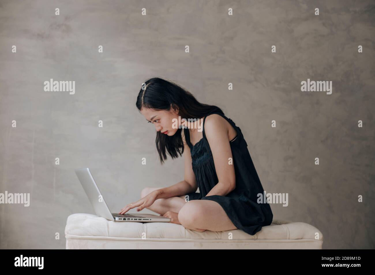 Asian beautiful woman thinking idea with laptop computer Stock Photo ...