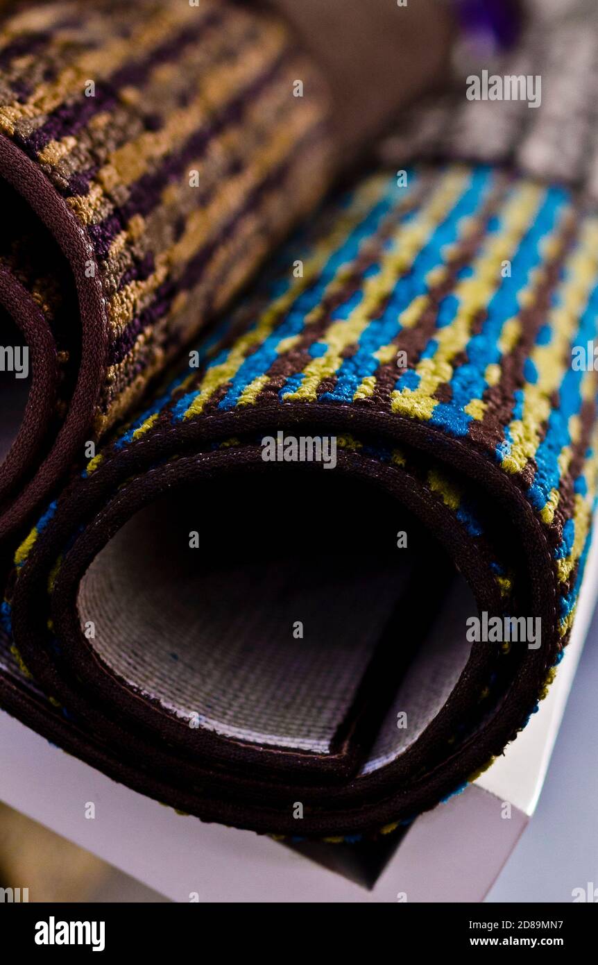 Blue and yellow indoor carpet Stock Photo - Alamy