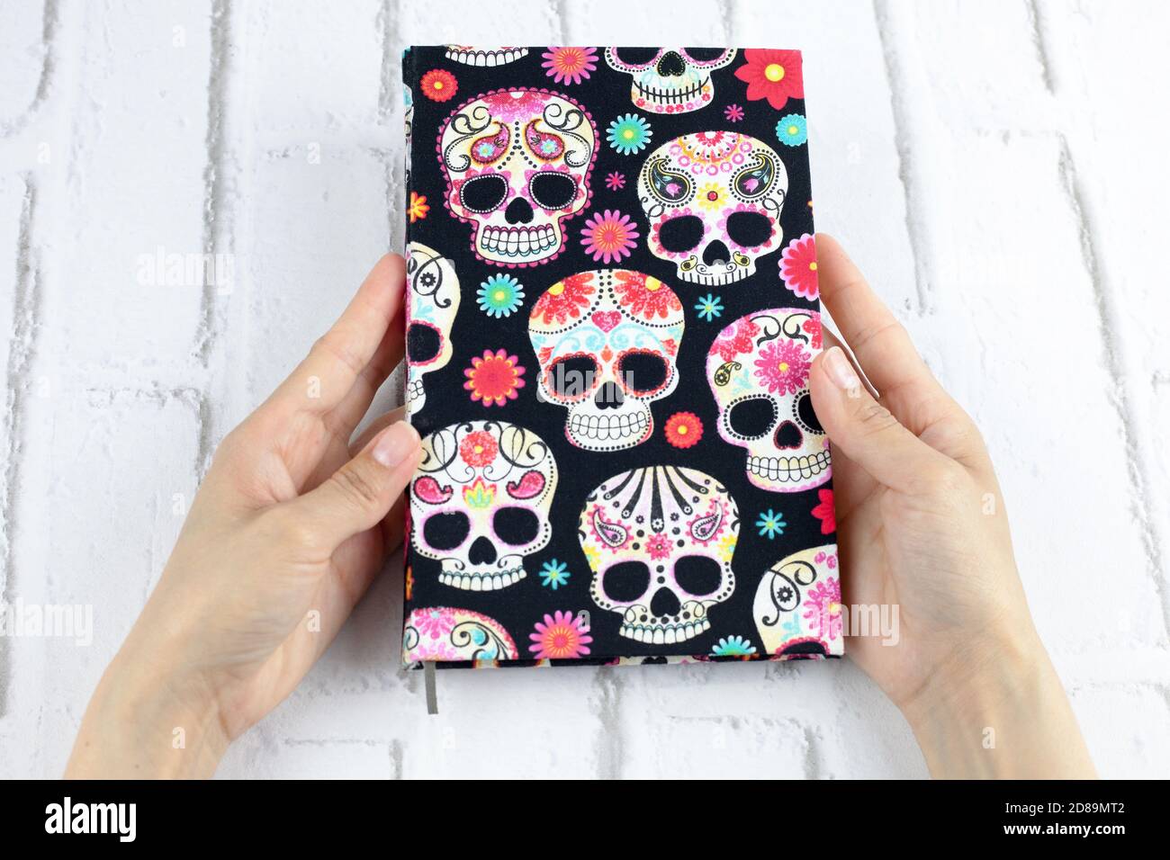 Handmade notebook with skulls fabric cover Stock Photo - Alamy