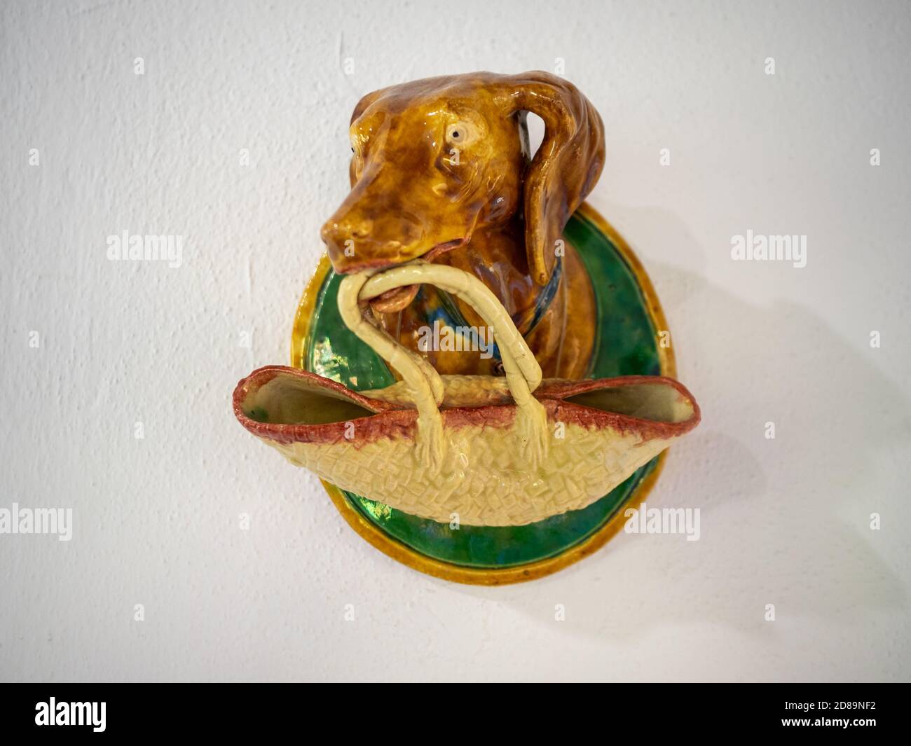 Rafael Bordalo Pinheiro ceramics wall decoration of dog with basket in ...