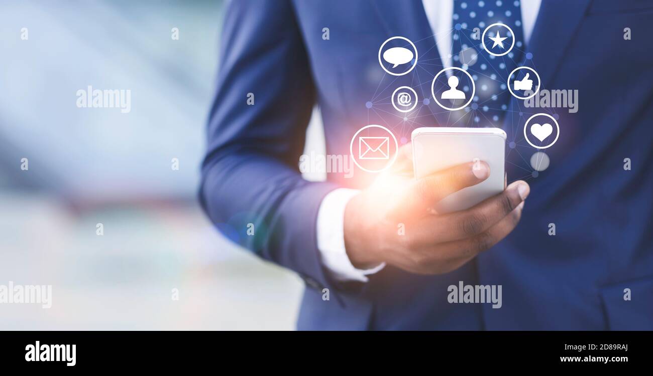 Black businessman promoting his company online, working on brand ...