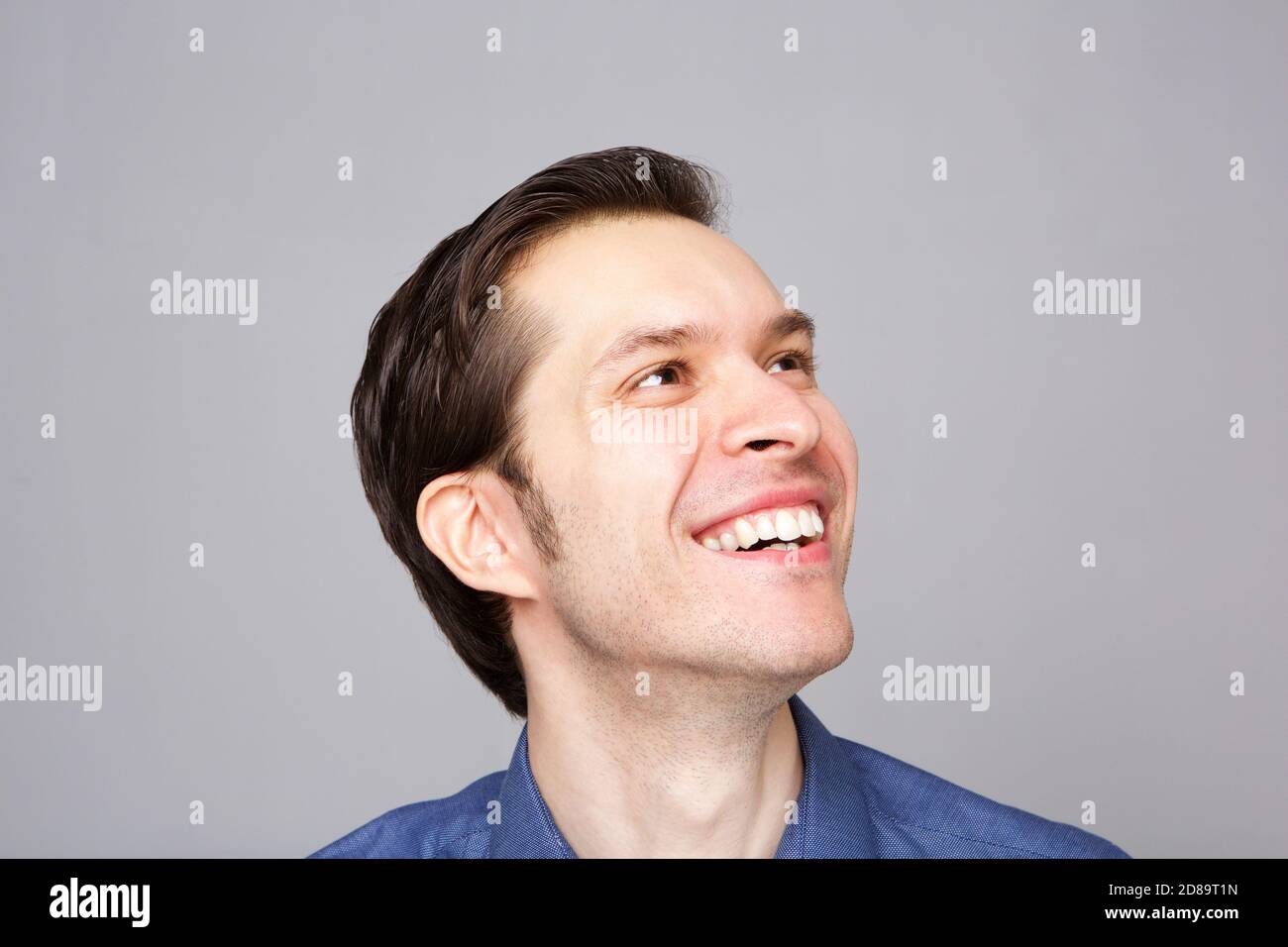 Smiling friendly young man hi-res stock photography and images - Alamy
