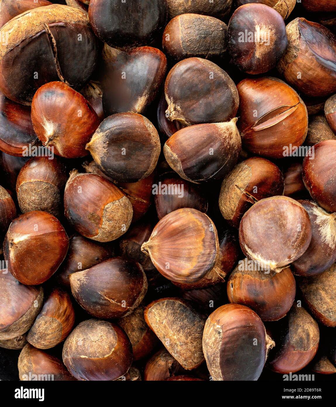 Roasted chestnuts as Background. Chestnuts for Christmas close-up Stock ...