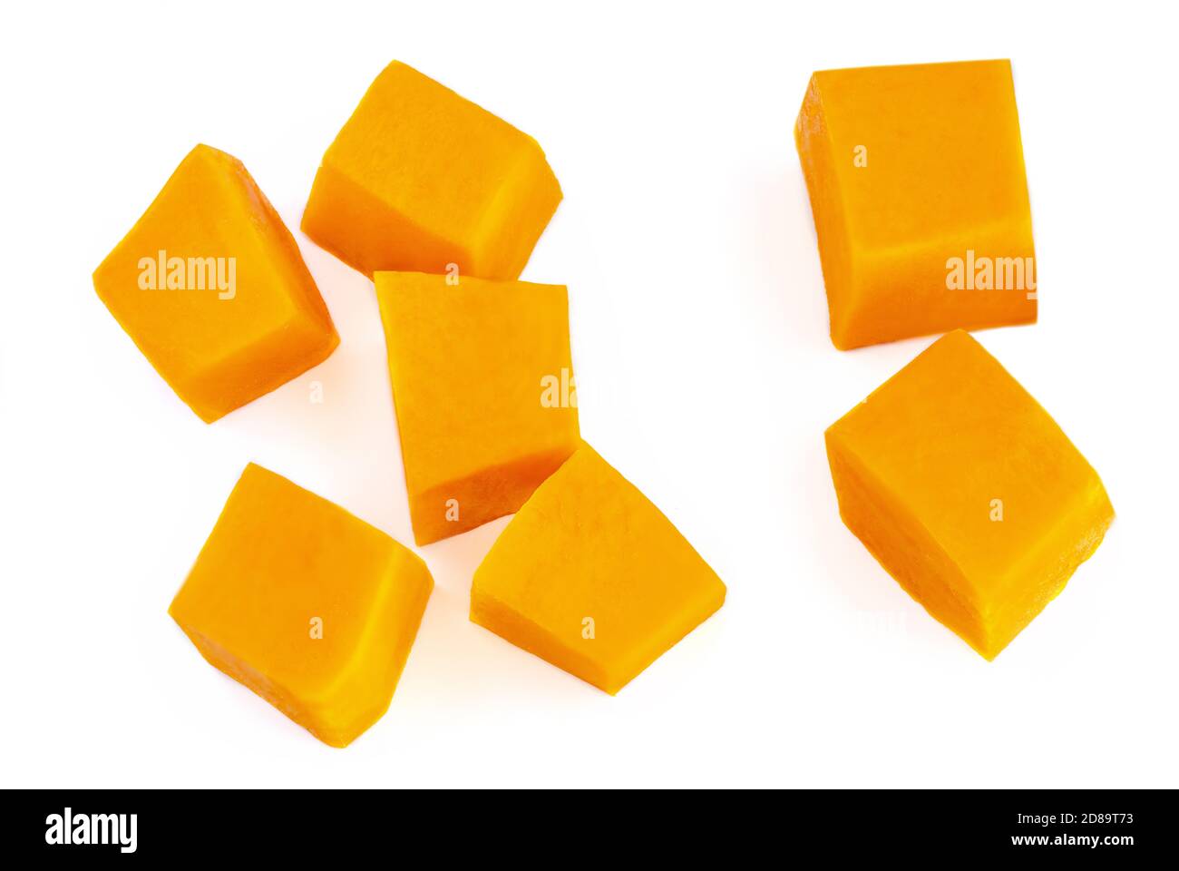 Diced Pumpkin isolated on white background. Fresh Pumpkin pieces cut in ...