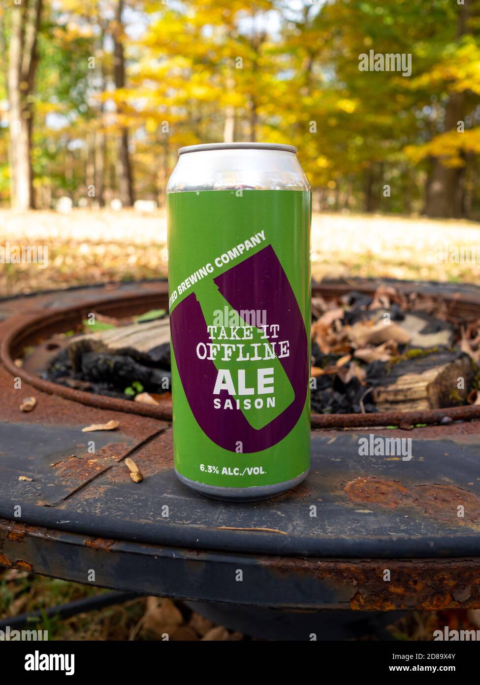 season ale beer can in the garden in the fall Stock Photo - Alamy