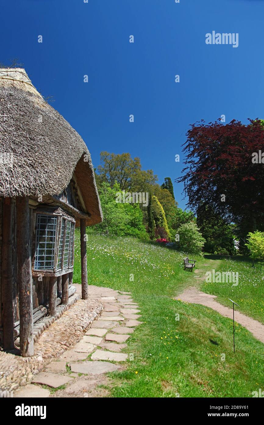 The thatched Bear House in the grounds of Killerton House, nr Exeter ...