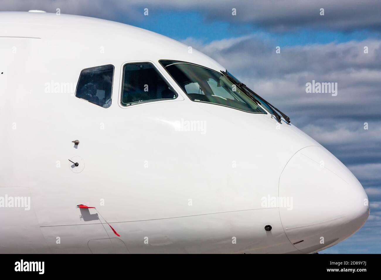 Close view of the cockpit of a white passenger plane outside Stock ...