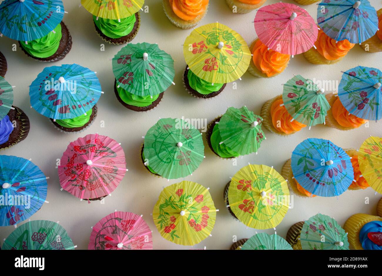 Photograph of umbrella cupcakes, colorful cupcakes with bright and ...