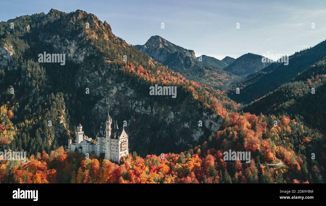 Castle New Schwanstein in autumn surrounded by colorful tress Stock ...